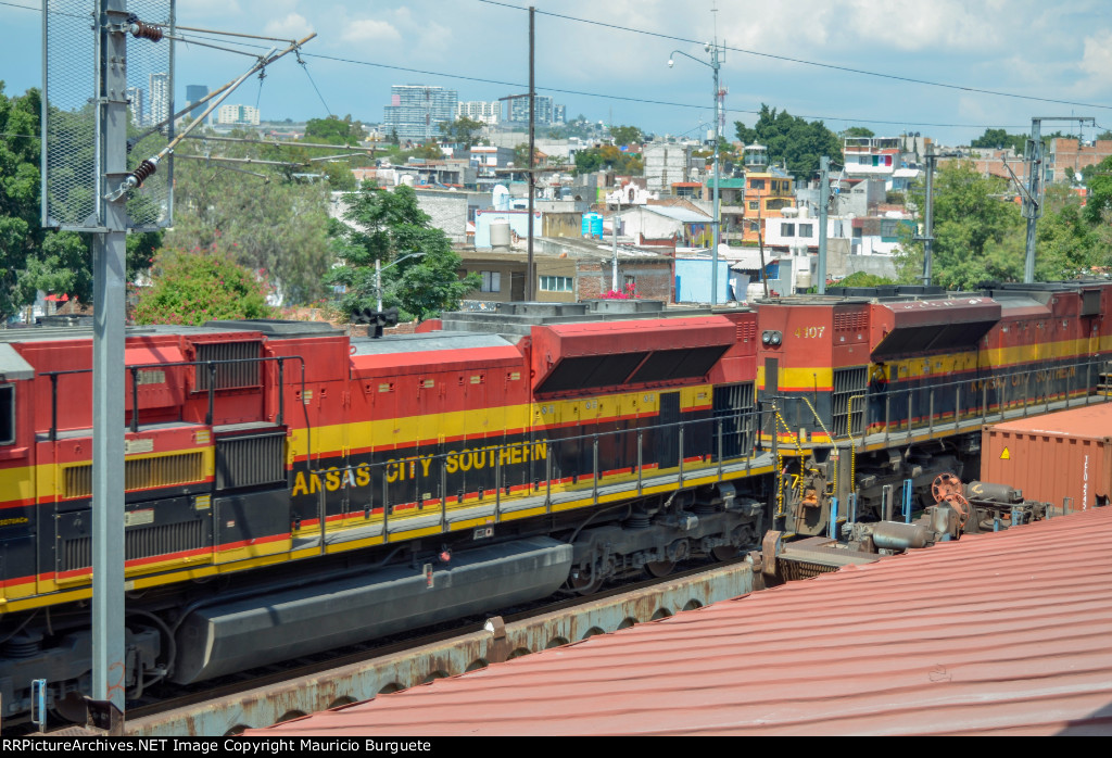 KCS SD70ACe leading a train